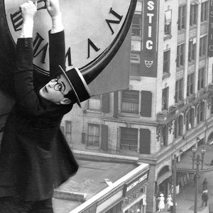 Harold Lloyd in Safety Last the Iconic Shot of Lloyd Hanging From the ...