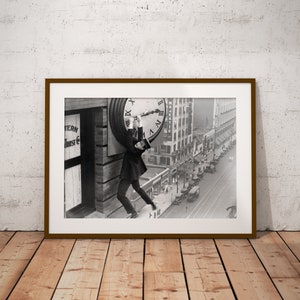 Harold Lloyd in Safety Last the Iconic Shot of Lloyd Hanging From the ...