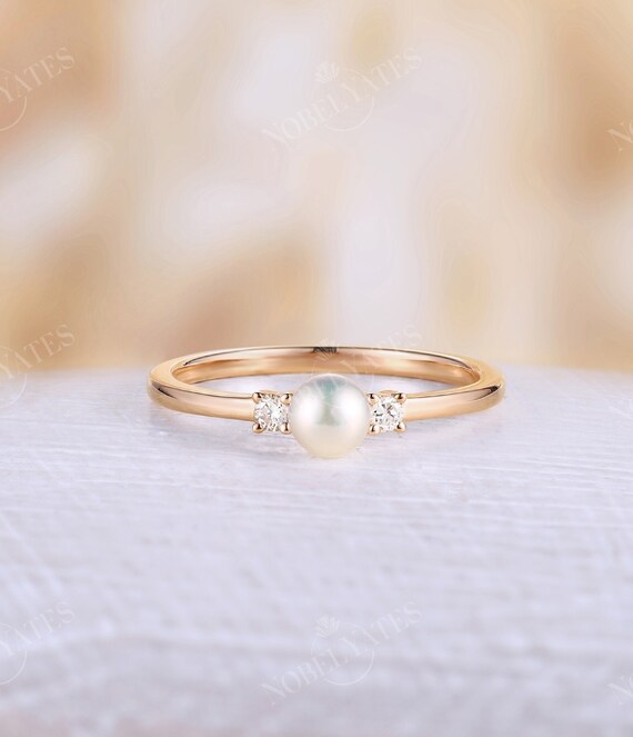 Simple Pearl Engagement Rings