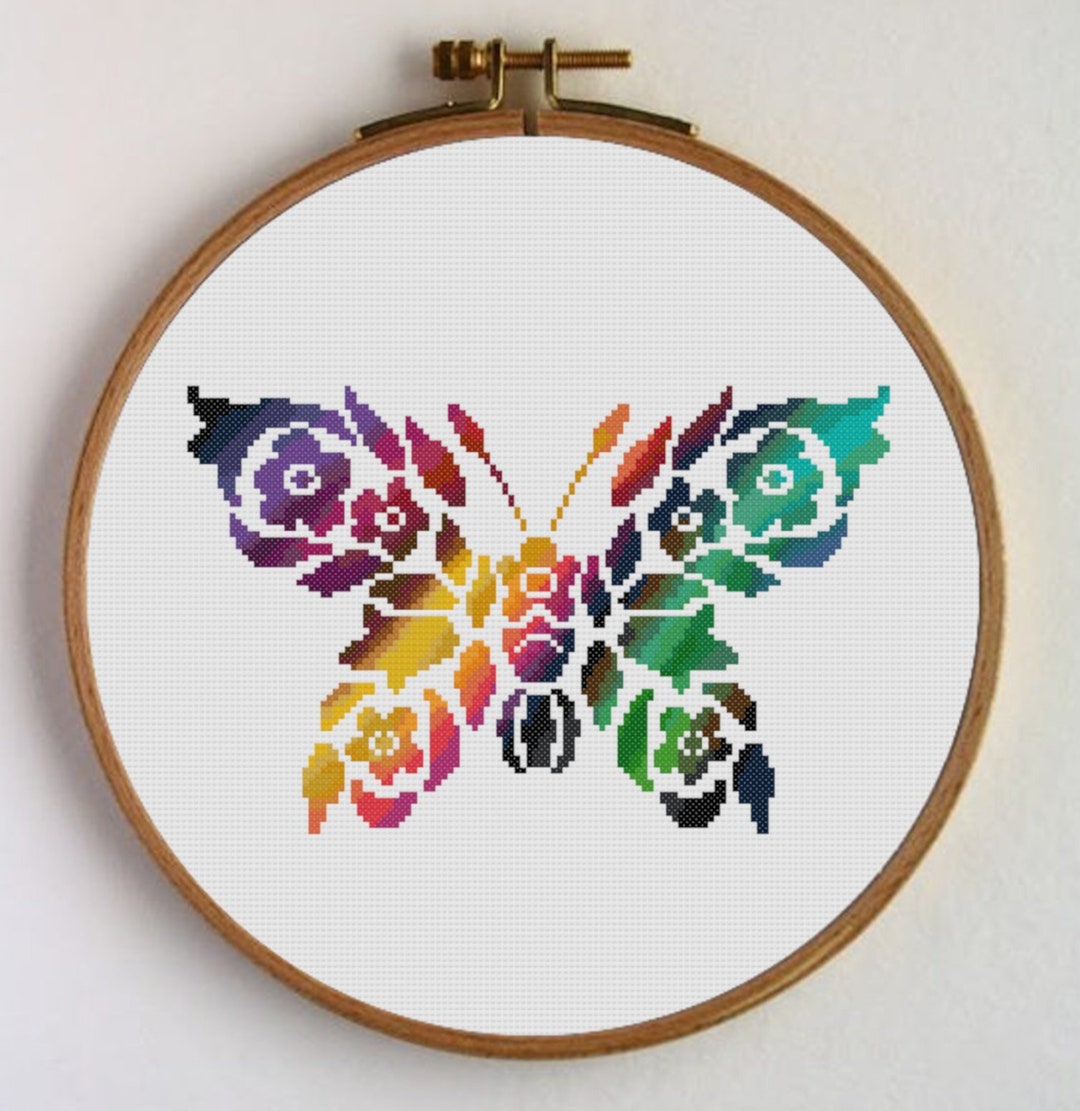 Butterfly cross-stitch pattern. Colored butterfly cross-stitch pattern ...