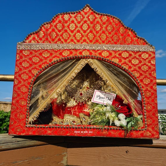 What is a doli in indian wedding photos - Weddingsavor.com