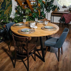 Round Extendable/non-extendable Table of Solid Oiled Wood FJÄRIL BLACK ...