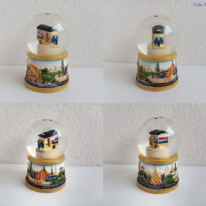 Traveler's Keepsakes: Souvenir Snow Water Globes of Unforgettable ...