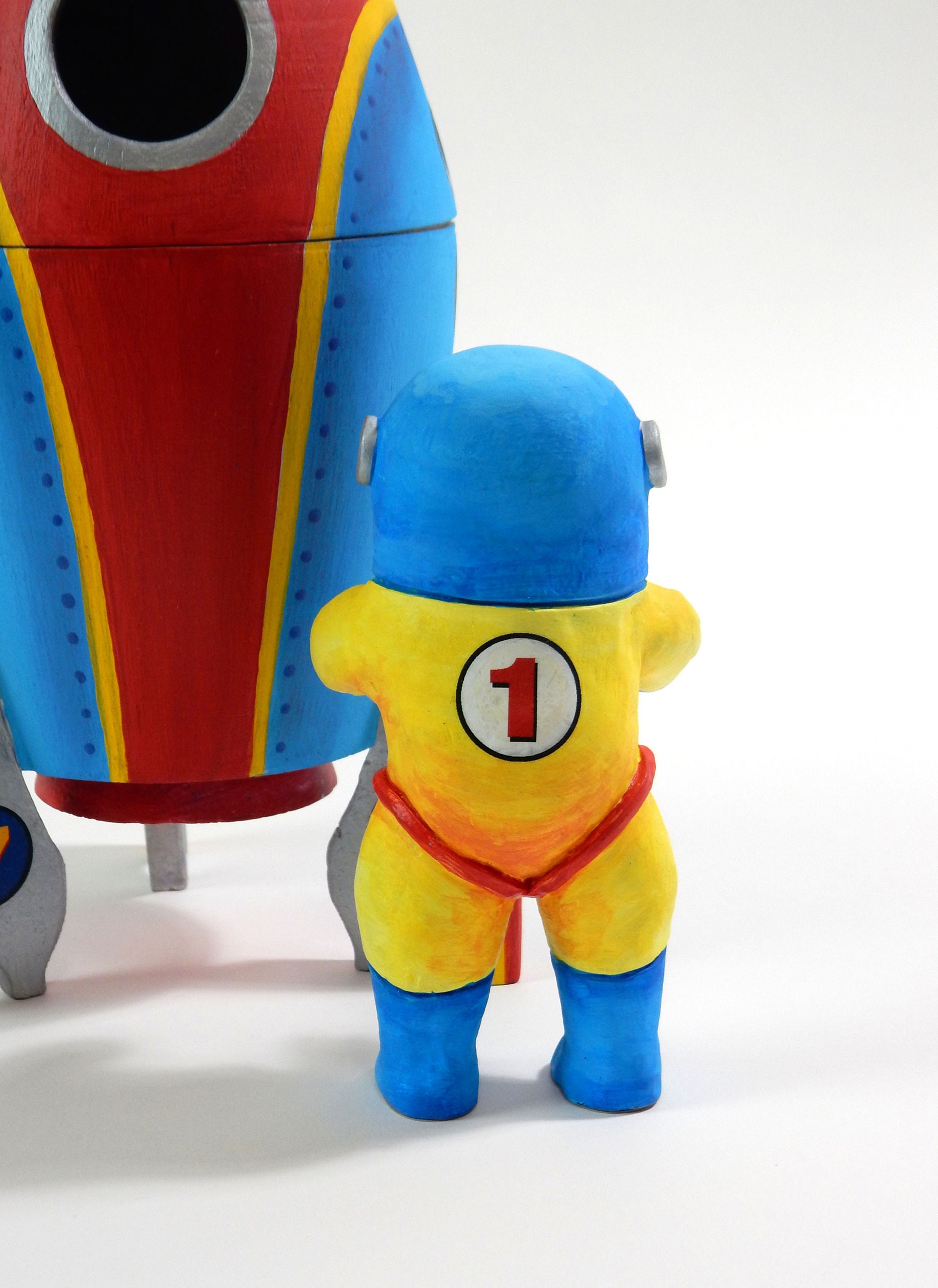 A Wooden Retro Styled Toy of a Rocket With Astronaut Pilot. A Fun Desk ...