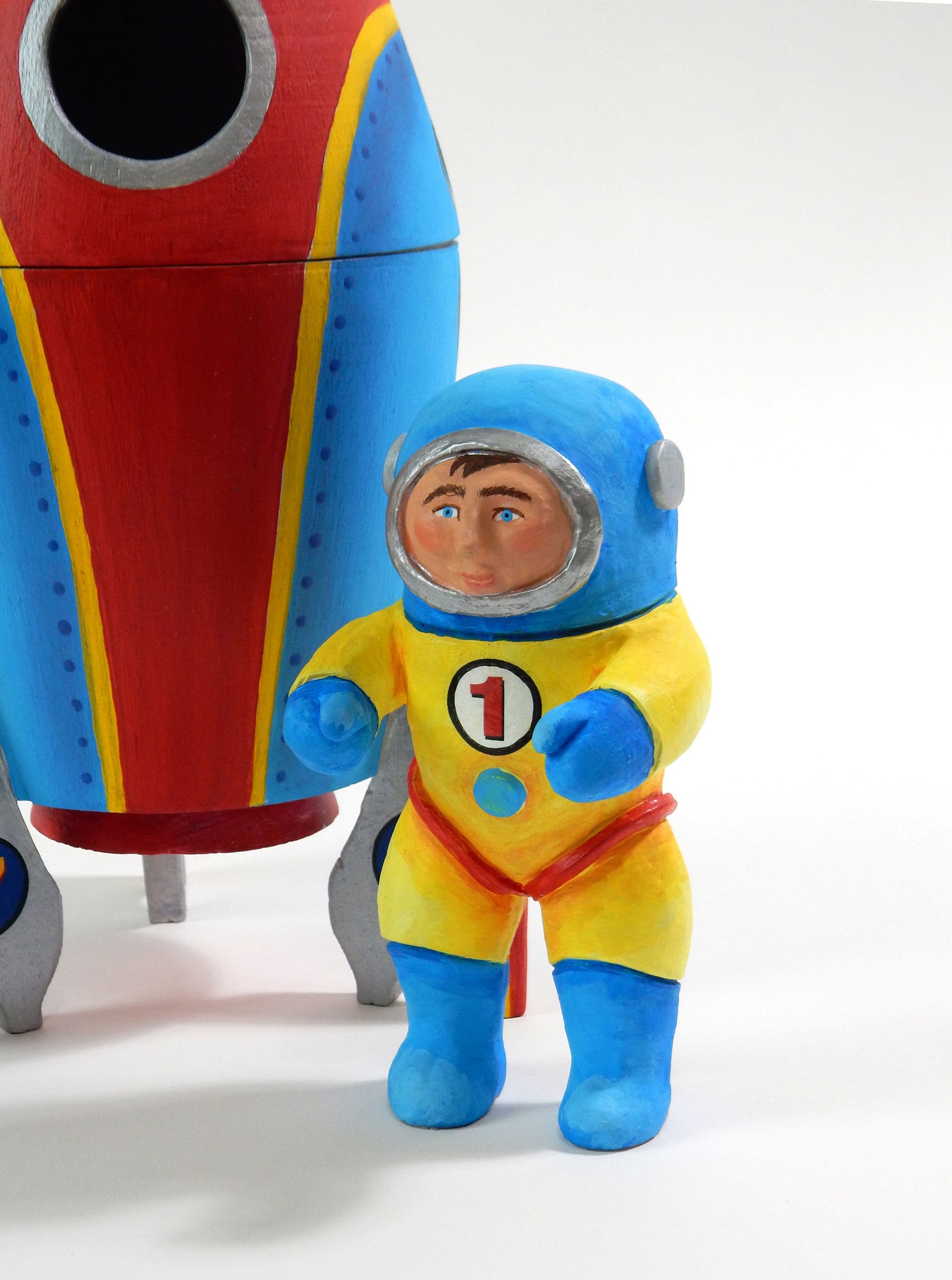 A Wooden Retro Styled Toy of a Rocket With Astronaut Pilot. A Fun Desk ...