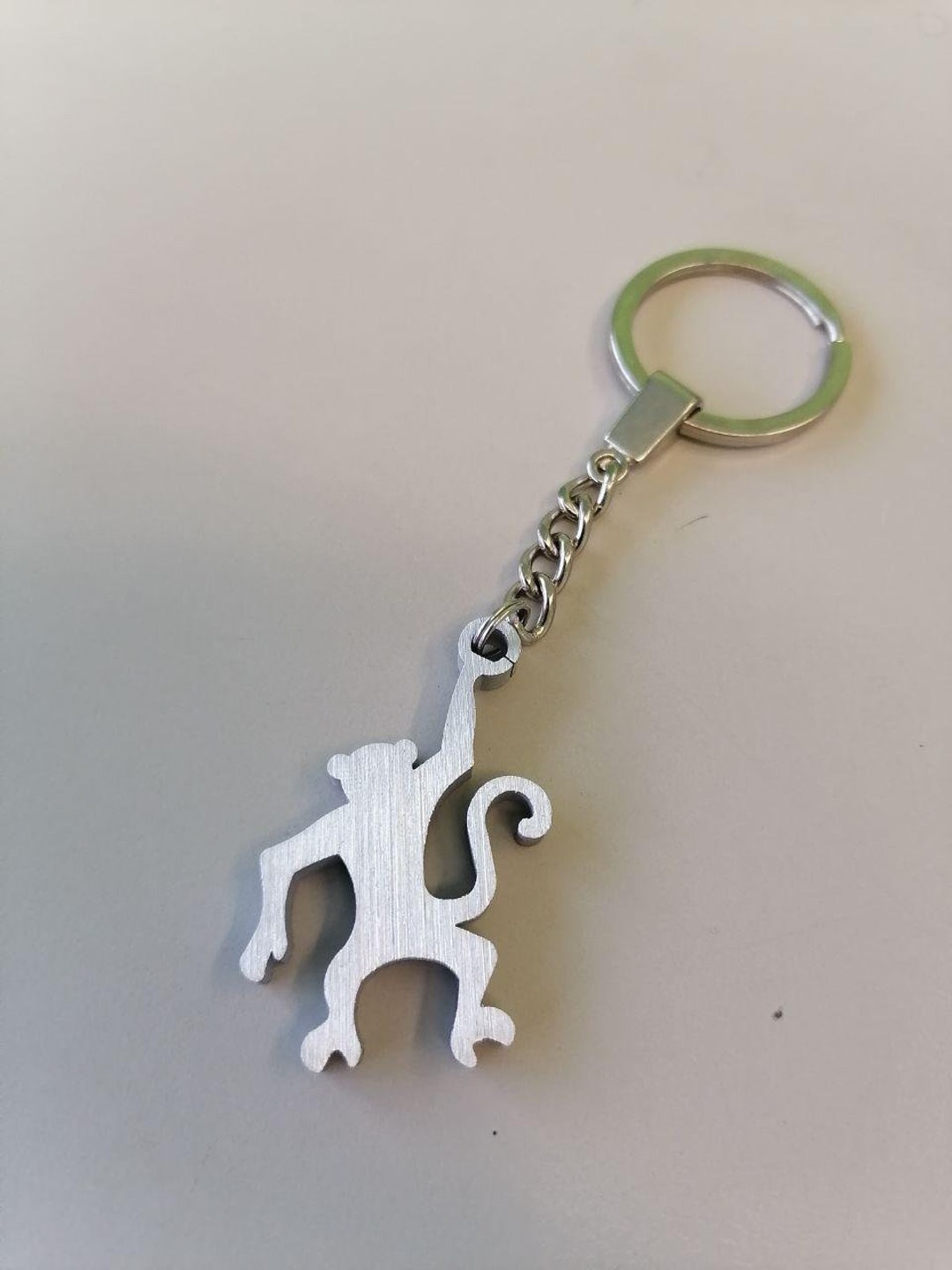 Hanging Monkey, Flying Monkey, Orangutan Keyring, Aluminum Hominid - Etsy