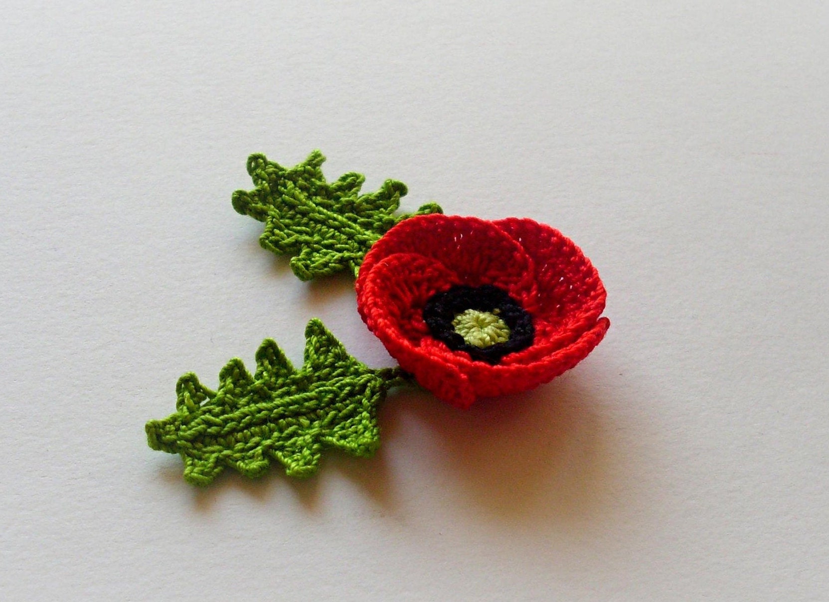 Small hand crochet poppy with two leaves small poppy | Etsy