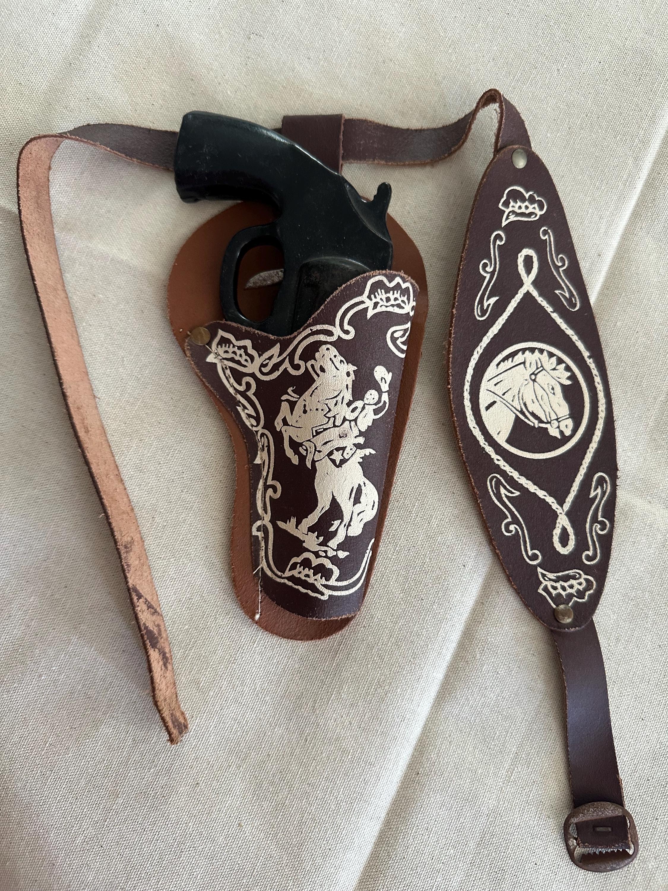 Vintage Buckaroo Toy Gun and Holster With a Whistling Lasso Toy ...