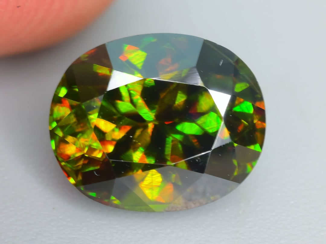 Chrome Sphene Gemstone: 1.55 Carat Faceted Oval, African Origin - Etsy