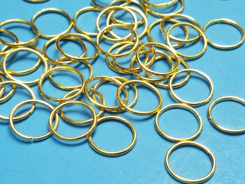 100 Pcs 14mm Jump Rings Golden Jump Rings Closed but - Etsy