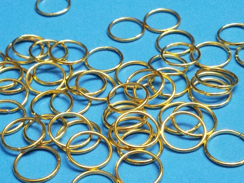 100 Pcs 14mm Jump Rings Golden Jump Rings Closed but | Etsy