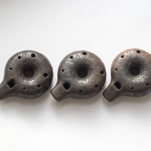 Ceramic Ocarina Black Donut. Woodwind Instrument With Engraved Star ...