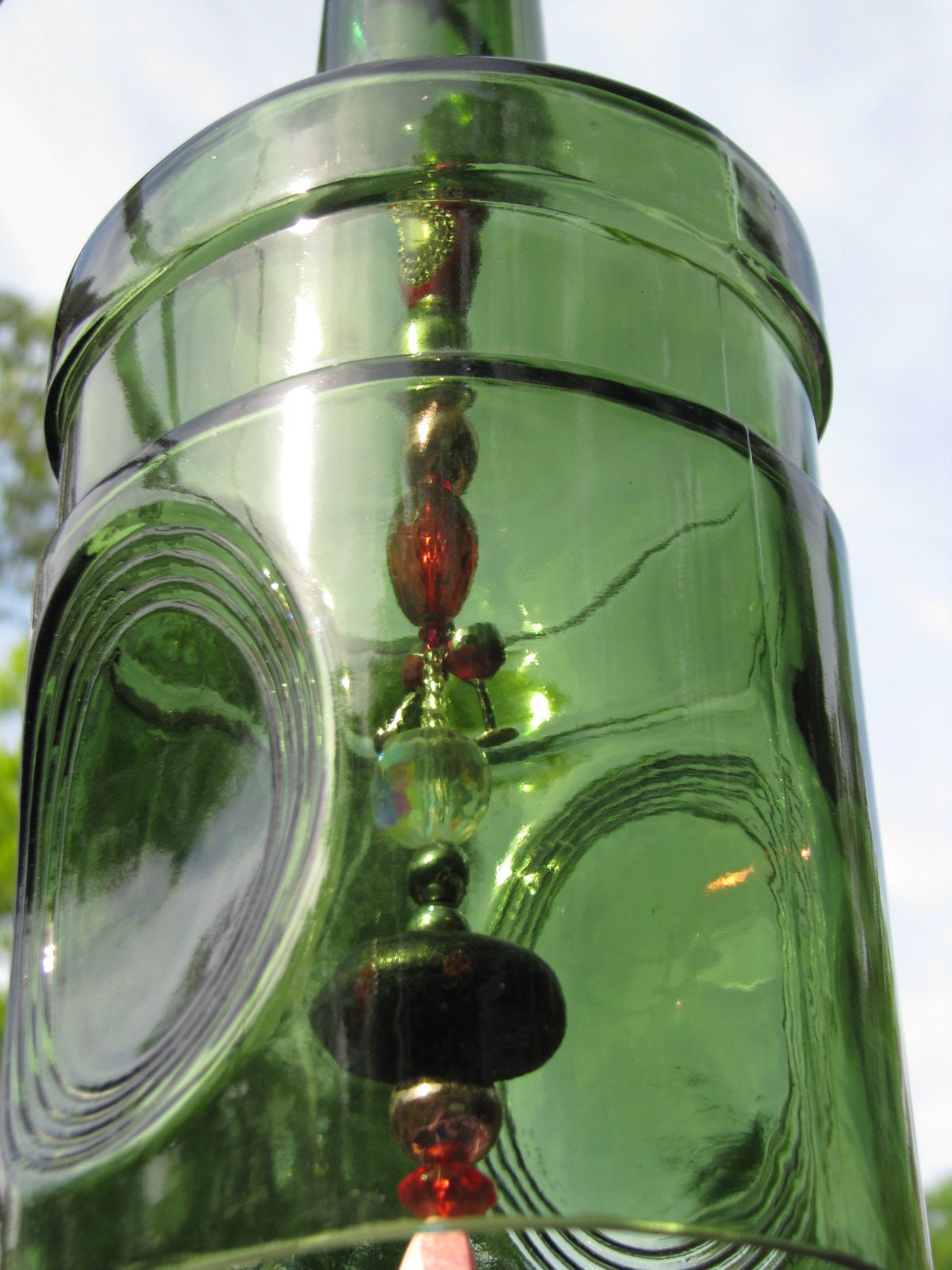 Giant green bottle wind chime, fancy sparkling beads, wine glasses ...