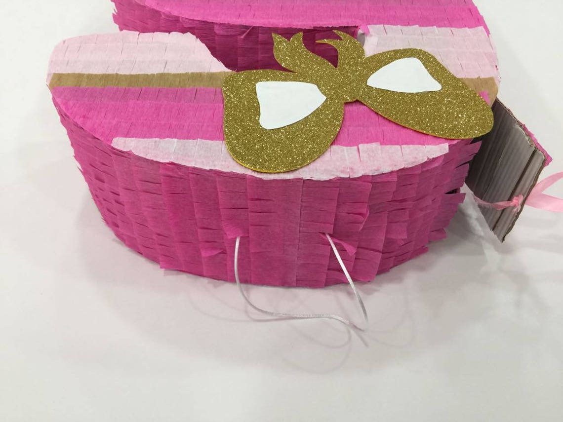 Piñata rosa / lazo dorado - Etsy España