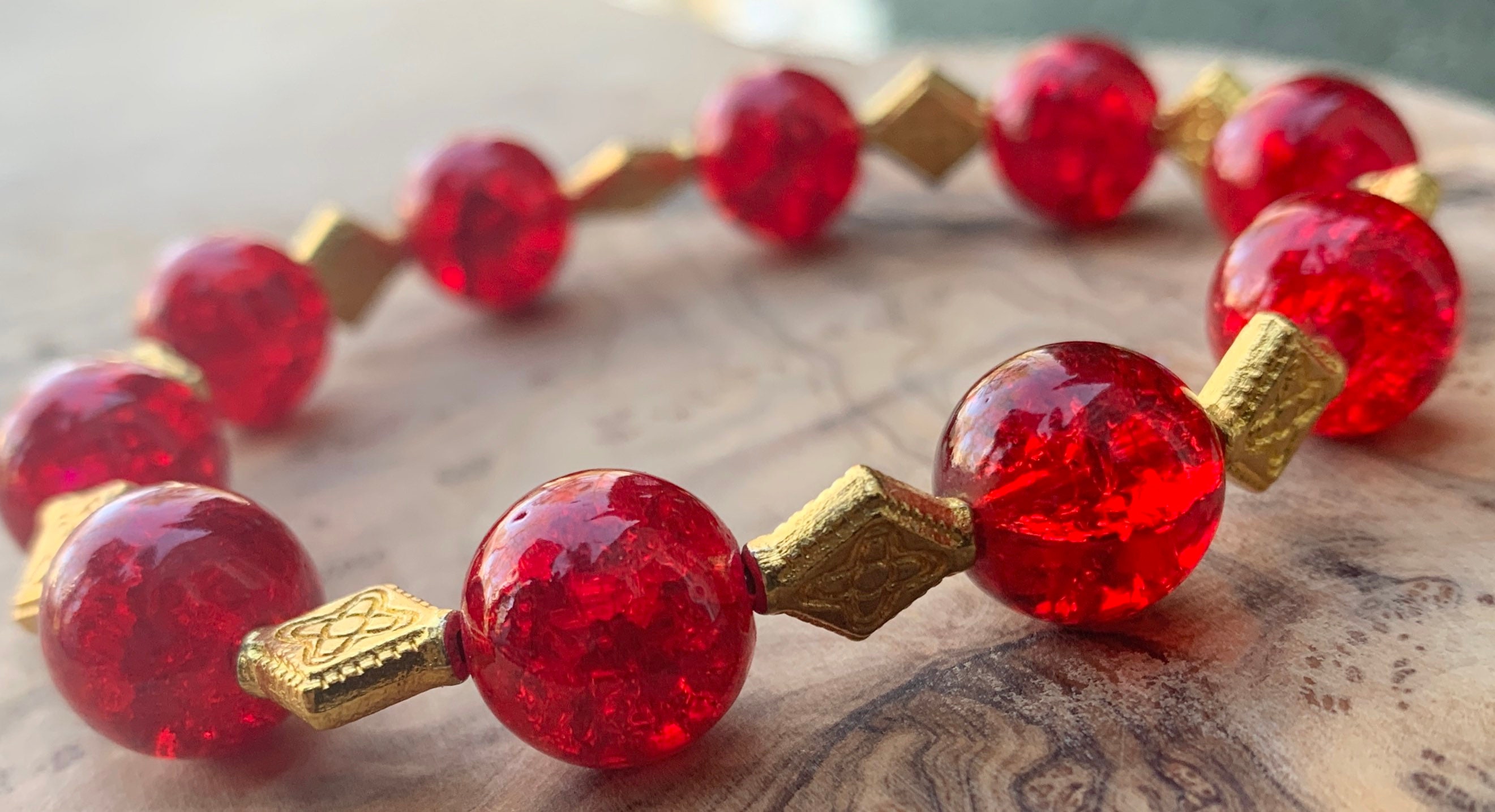 Stunning red glass with gold colored accents. | Etsy