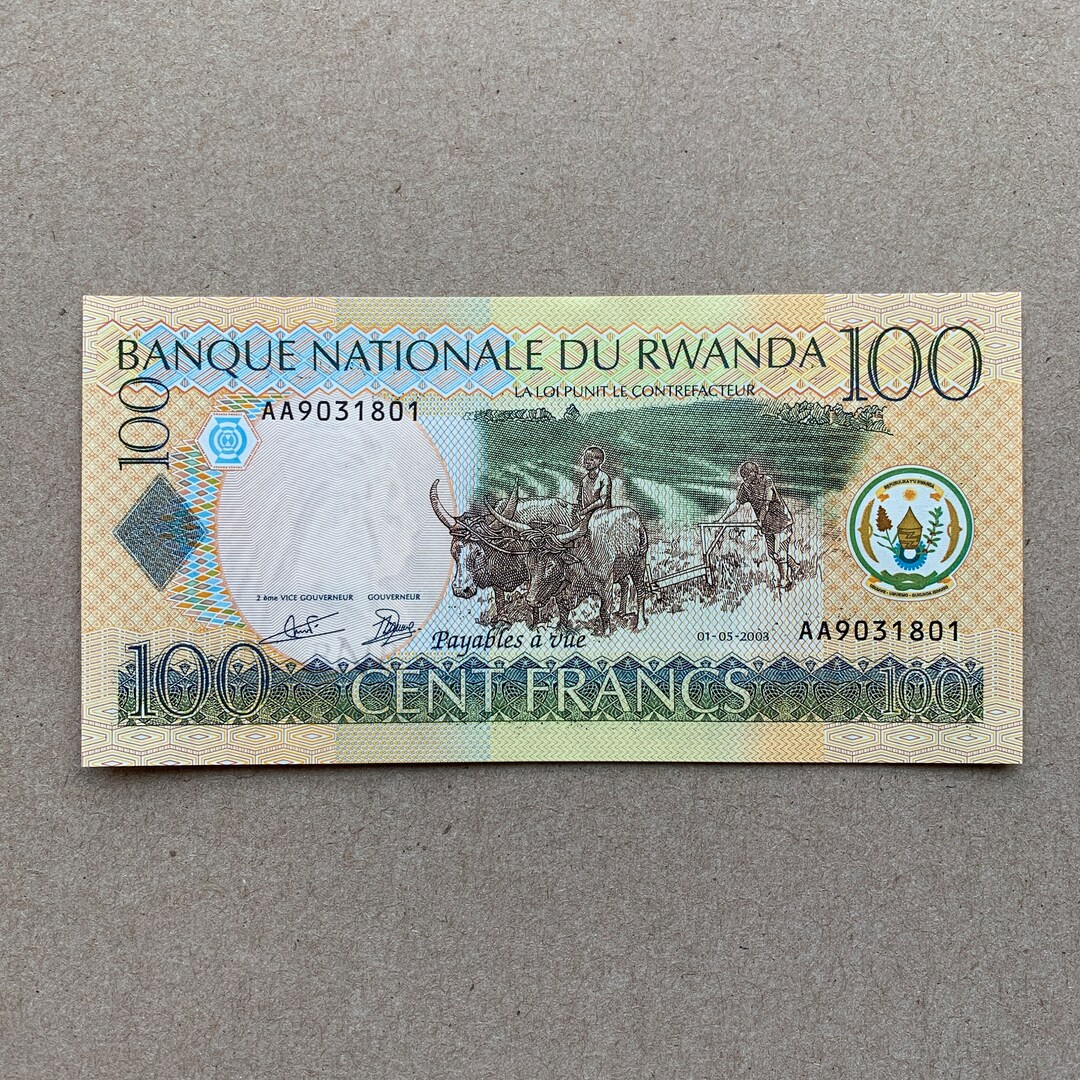 Rwanda 100 Franc Banknote. Rwandan Currency. Oxen and Farmer Plowing at ...