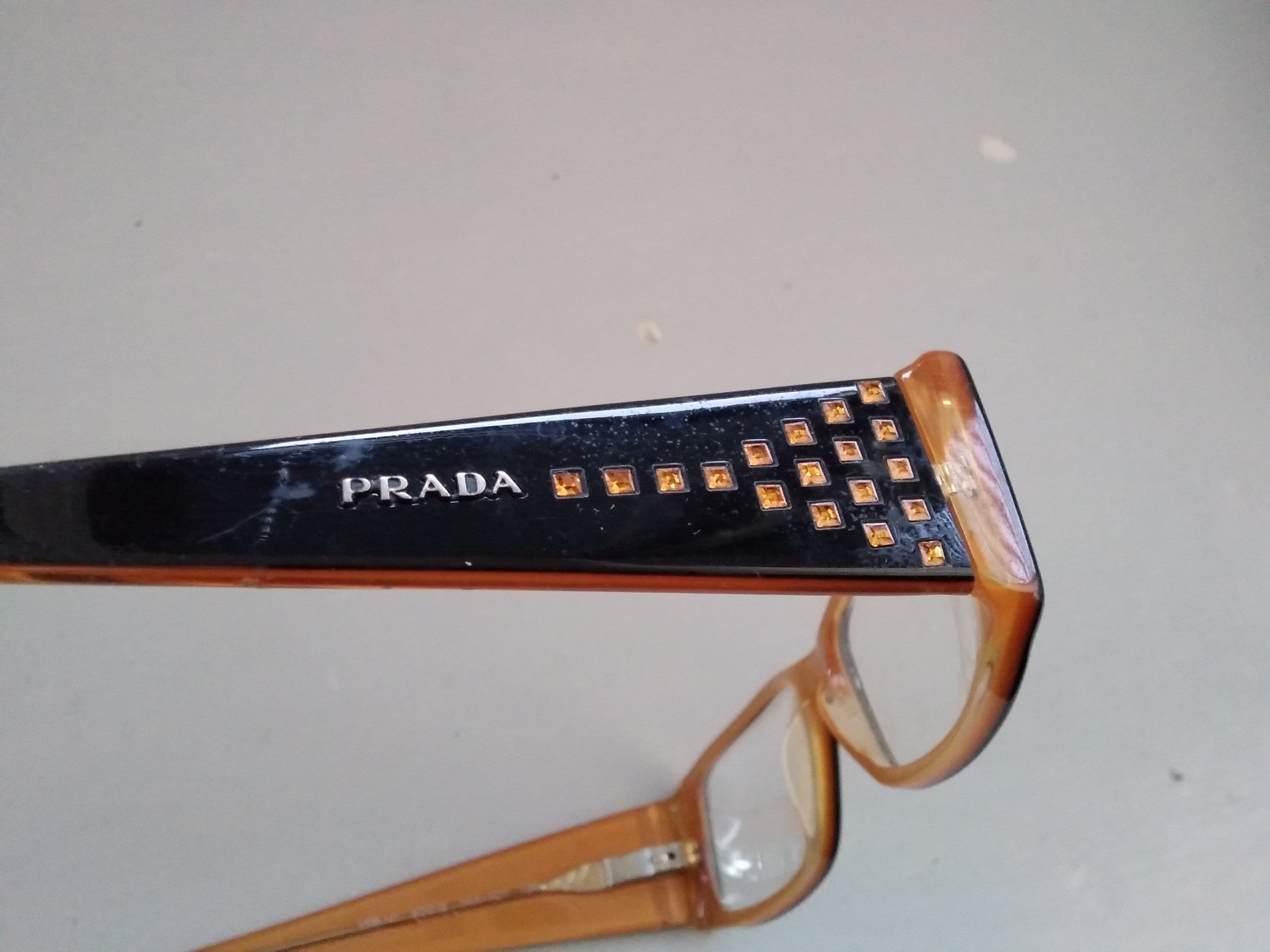 Prada Black Outer Rectangular Frames, With Amber Decoration on the Arms ...