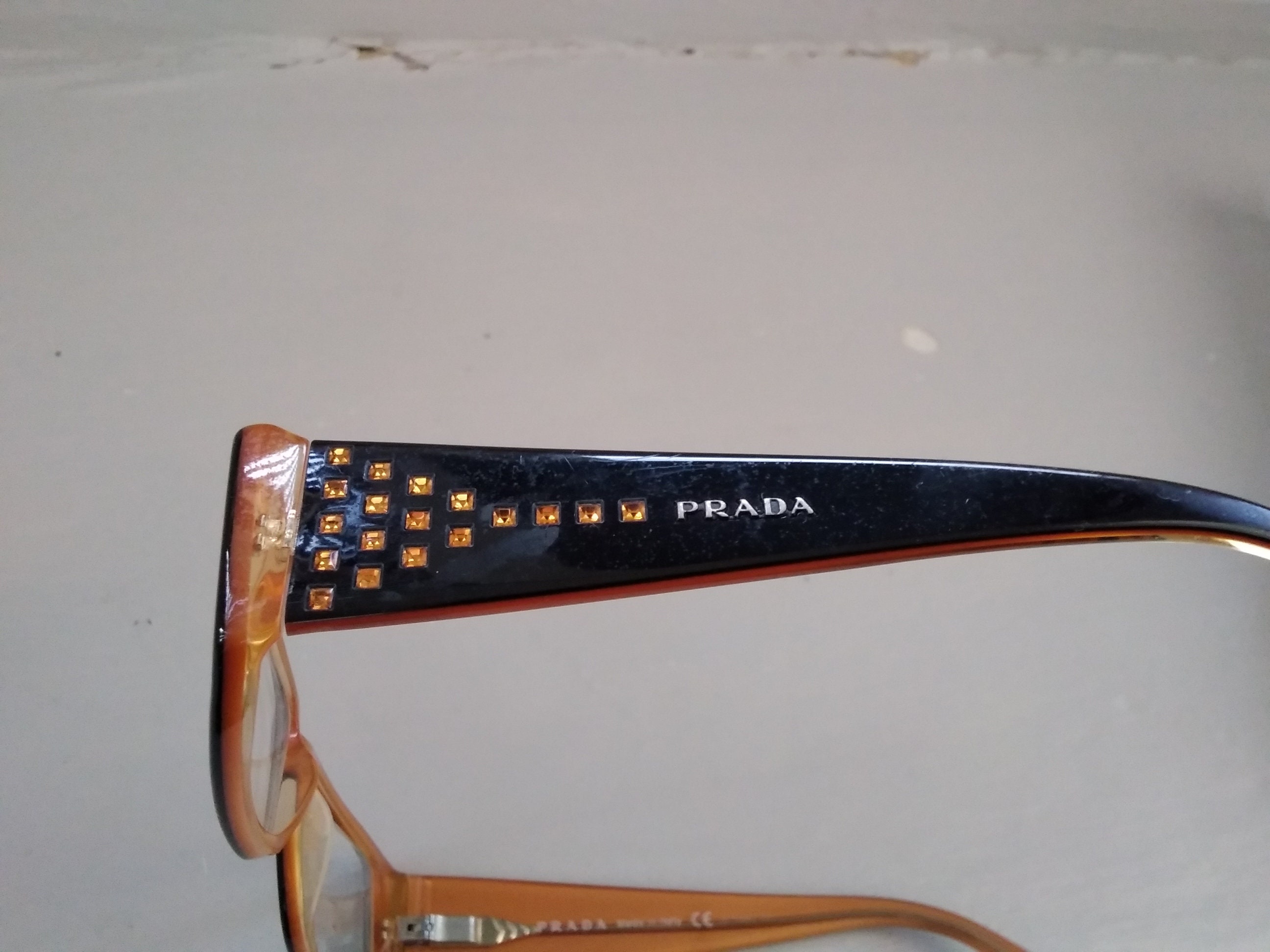 Prada Black Outer Rectangular Frames, With Amber Decoration on the Arms ...