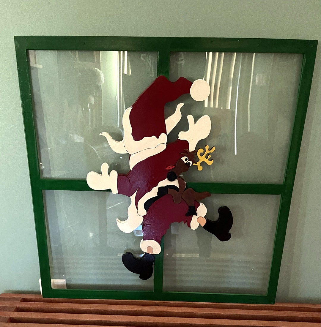 Christmas Decor Santa and a Reindeer Hitting a Window Splat. Rudolph ...