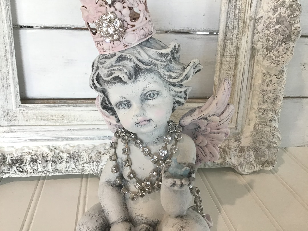 Cherub Holding Bird Crowned Cherub Cherub With Crown Winged Cherub ...