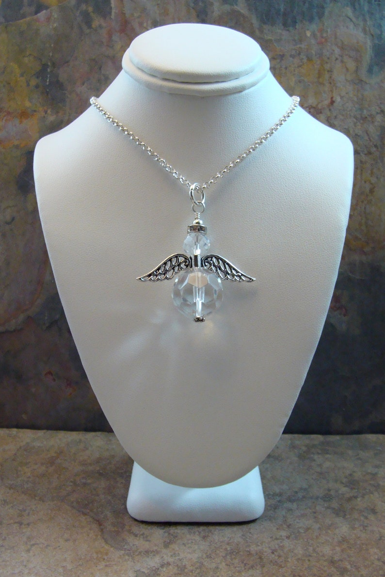 Faceted glass angel pendant with silver plated wings & halo | Etsy