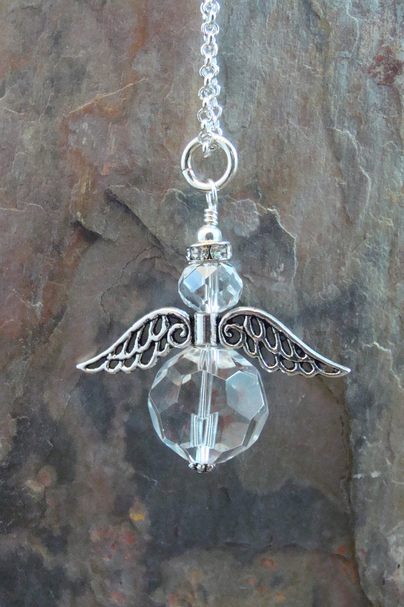 Faceted glass angel pendant with silver plated wings & halo | Etsy