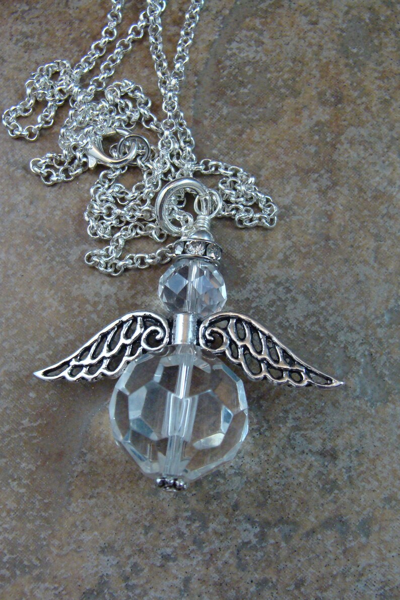 Faceted glass angel pendant with silver plated wings & halo | Etsy