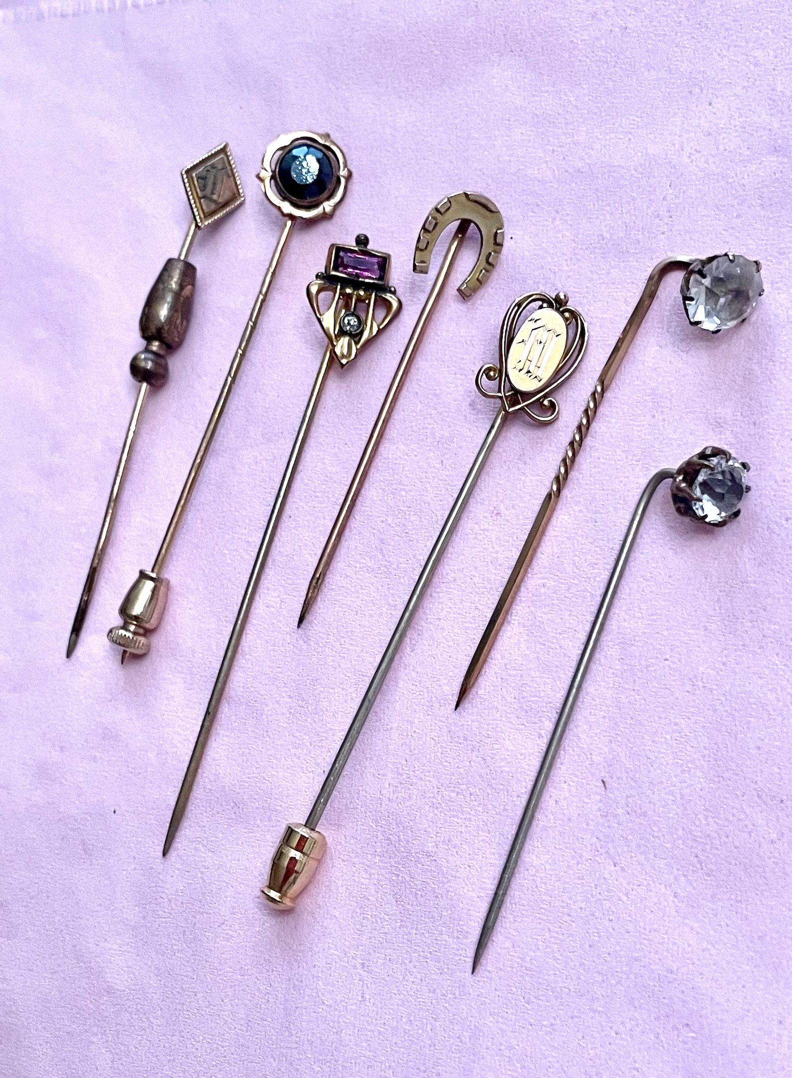 A Collection of 7 Pieces of Victorian Hat Pins in Goldfilled and Rolled ...