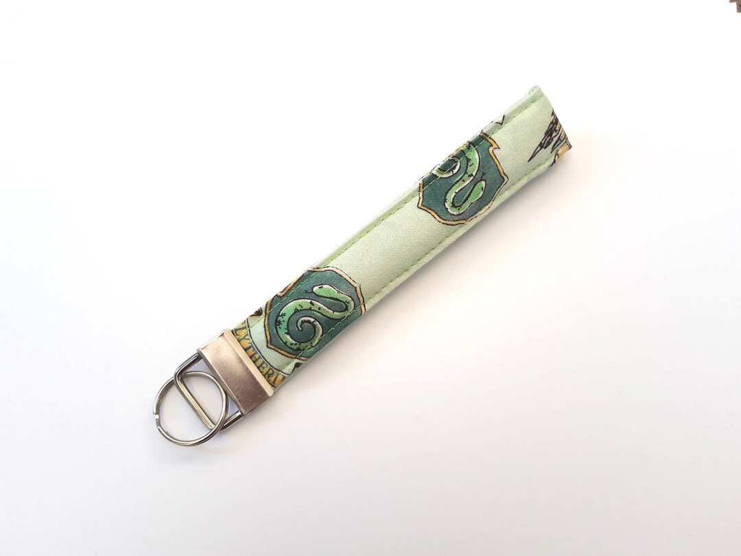 Free Shipping Harry Potter Slytherin Crest Keyring, Wristlet, Wristlet ...