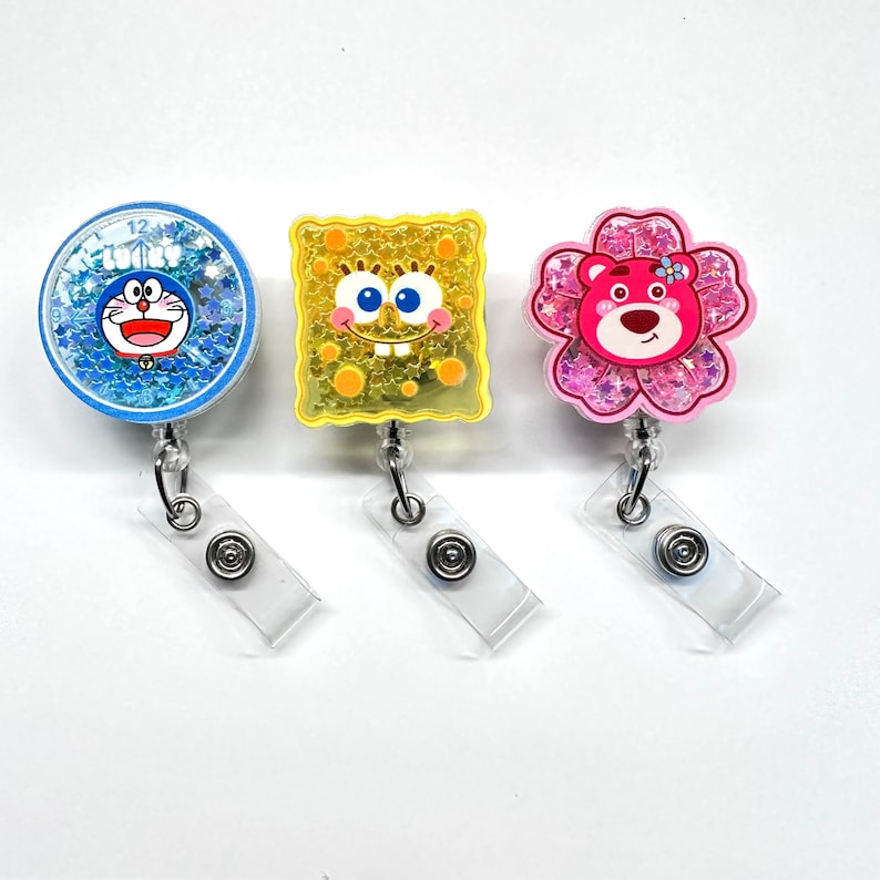 SALE !!!!! 1 Pc Cute Floating Glitter Cartoon Character Retractable ID ...