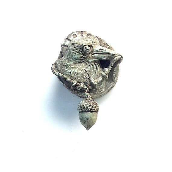 Handmade bas relief raven tile with acorn for home or garden | Etsy