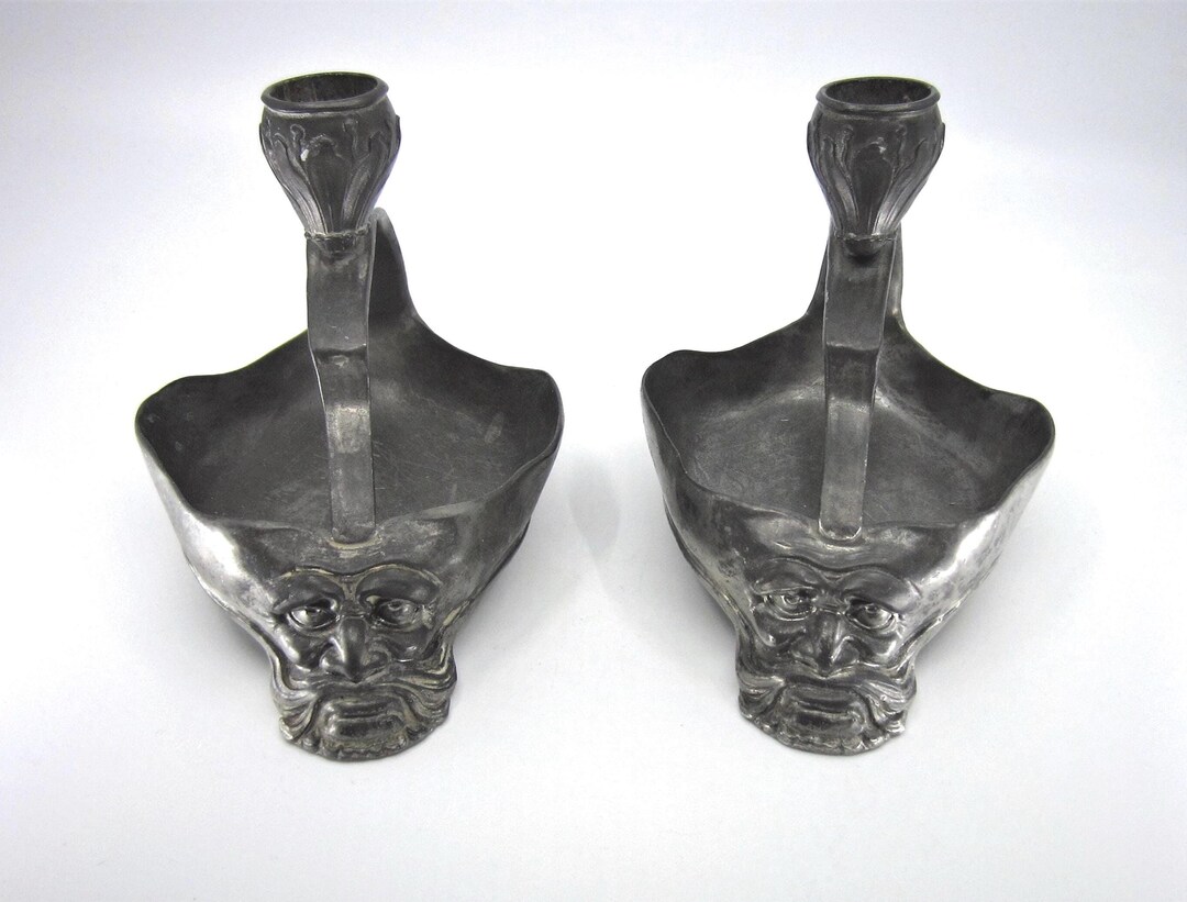 A Pair of Antique Pewter Chamber Candlesticks With Two Bearded Heads ...