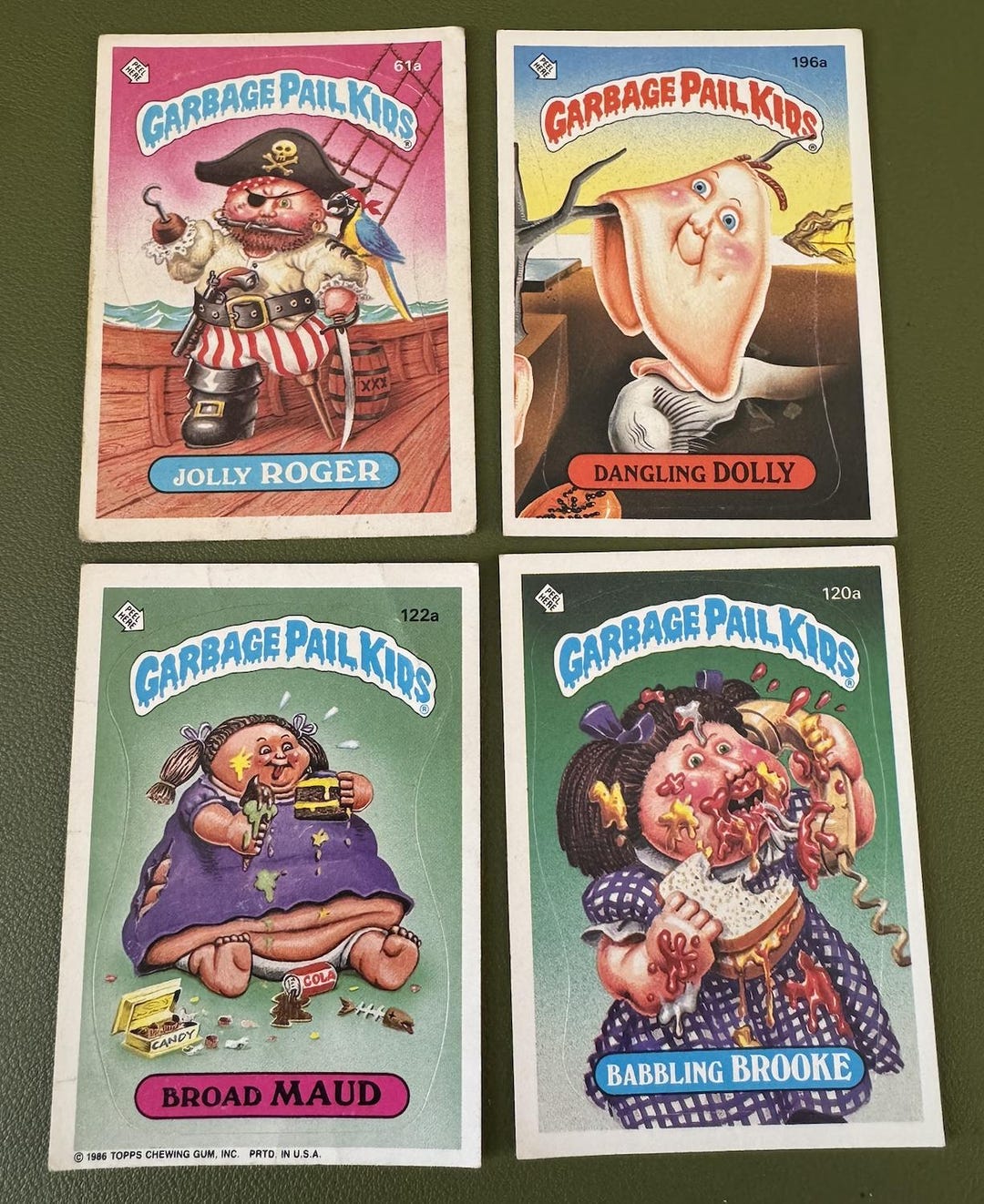 Topps - Garbage Pail Kids - Jolly Roger 61a, Dangling Dolly 196a, Broad ...