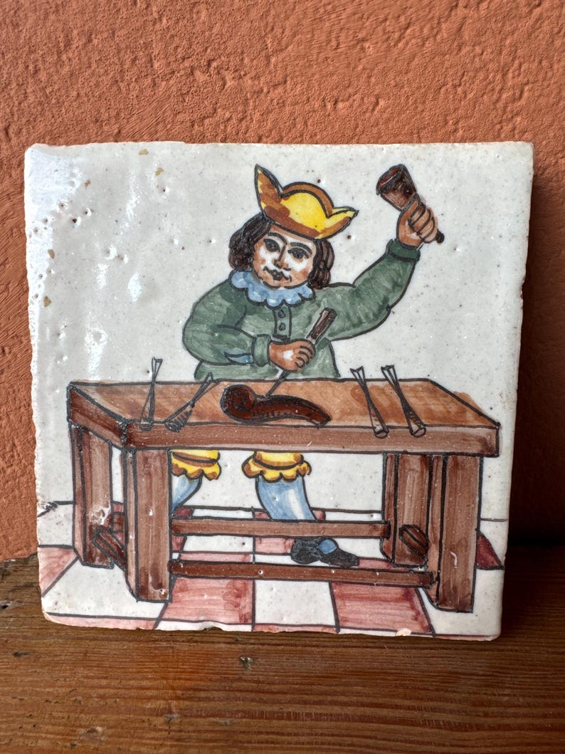 Antique Tile. Hand-painted Tile. Artist Carving a Piece of Wood ...