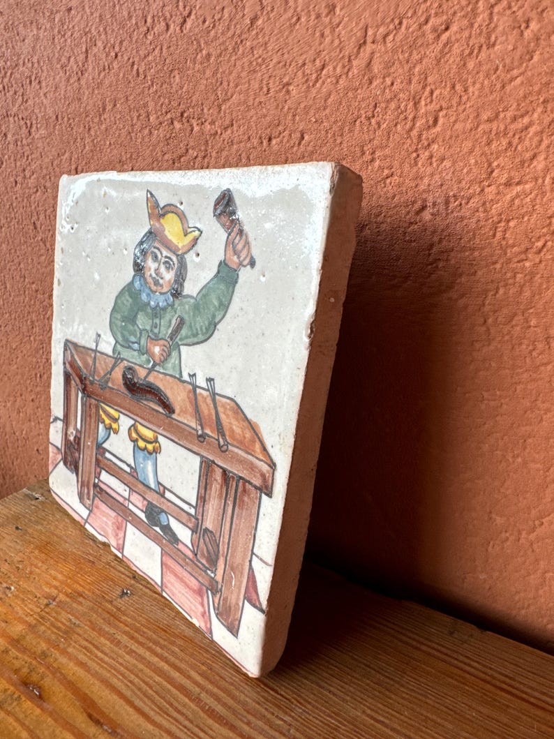 Antique Tile. Hand-painted Tile. Artist Carving a Piece of Wood ...
