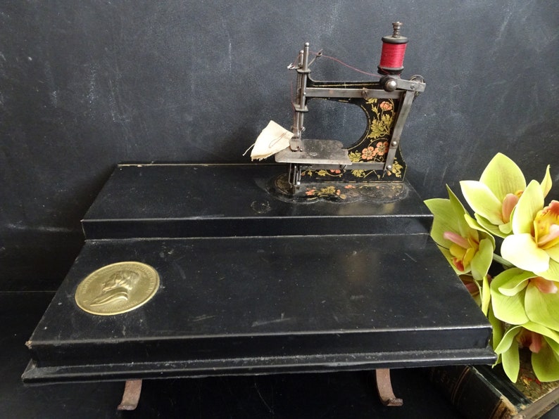 Antique French Miniature Sewing Machine on Display Stand, DRGM No 20557 ...