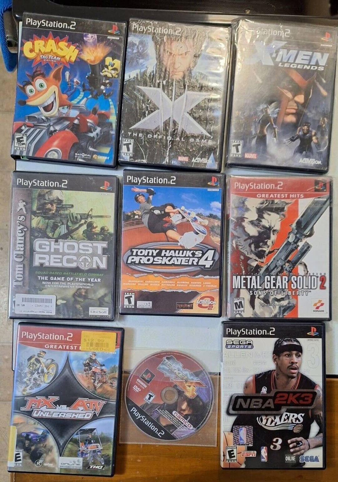 PS2 Gamecase 9 Pc LOT X-men, Crash, Ghost, Tekken 4, NBA 2K3 and More ...