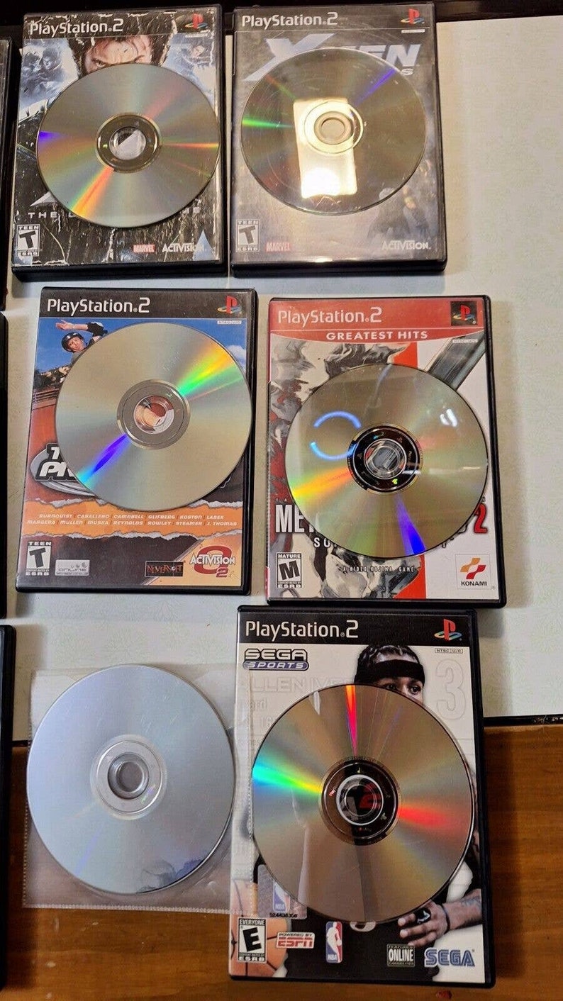 PS2 Gamecase 9 Pc LOT X-men, Crash, Ghost, Tekken 4, NBA 2K3 and More ...