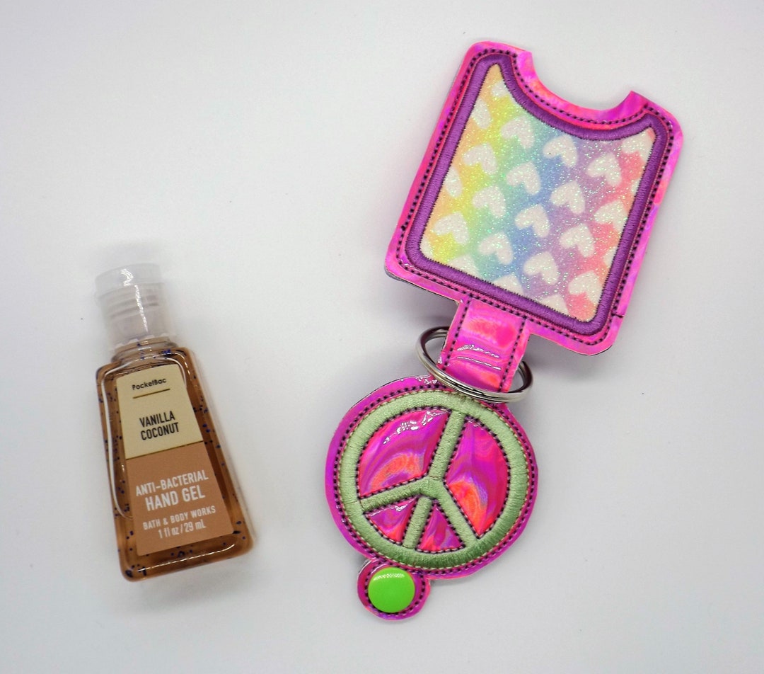 Stylish and Sustainable Peace Sign Fold Over Sanitizer Holder – Machine ...