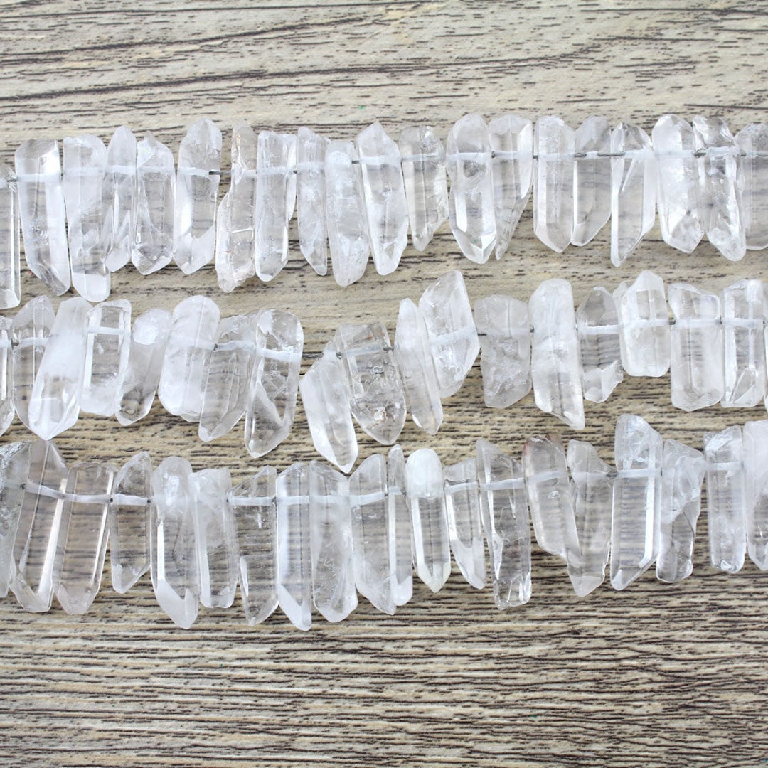 Polished Clear Quartz Point Beads Graduated Centre Drilled Faceted ...