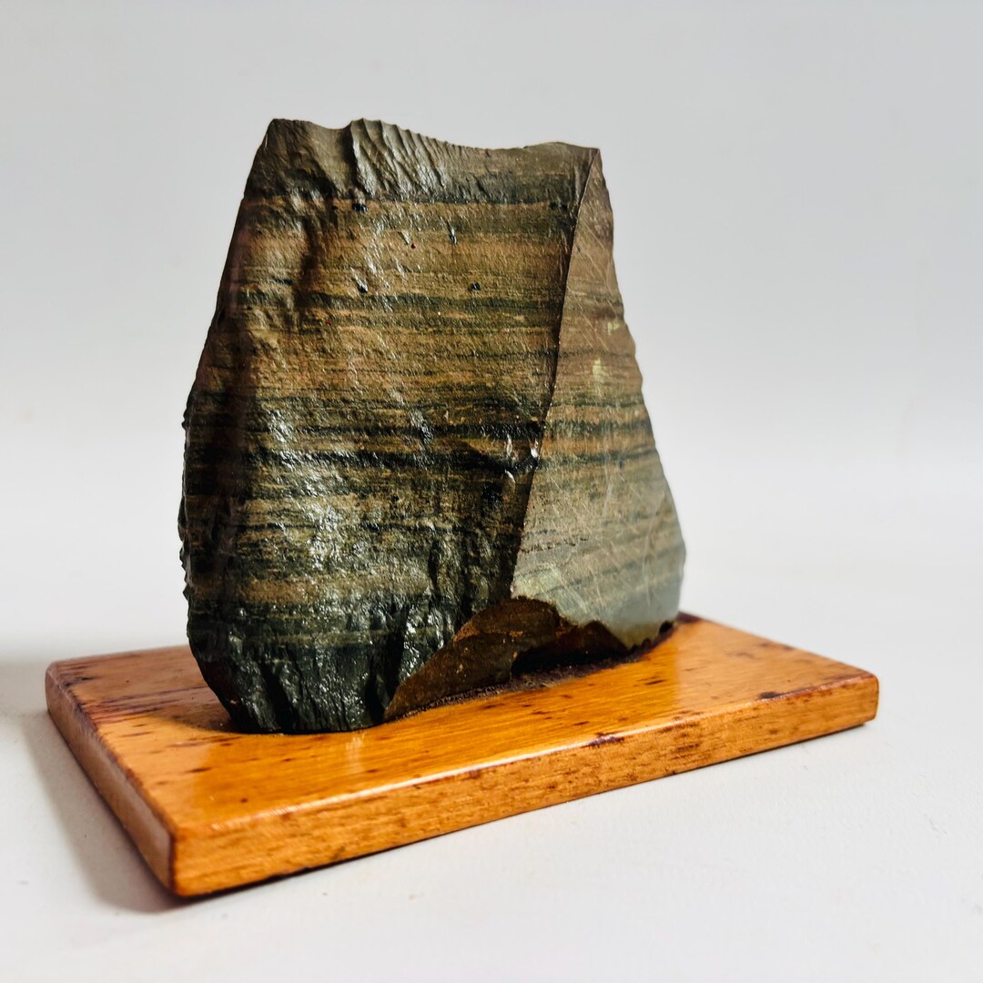 Antique Pre-cambrian Volcanic Rock Specimen: Charnian Group on Wooden ...