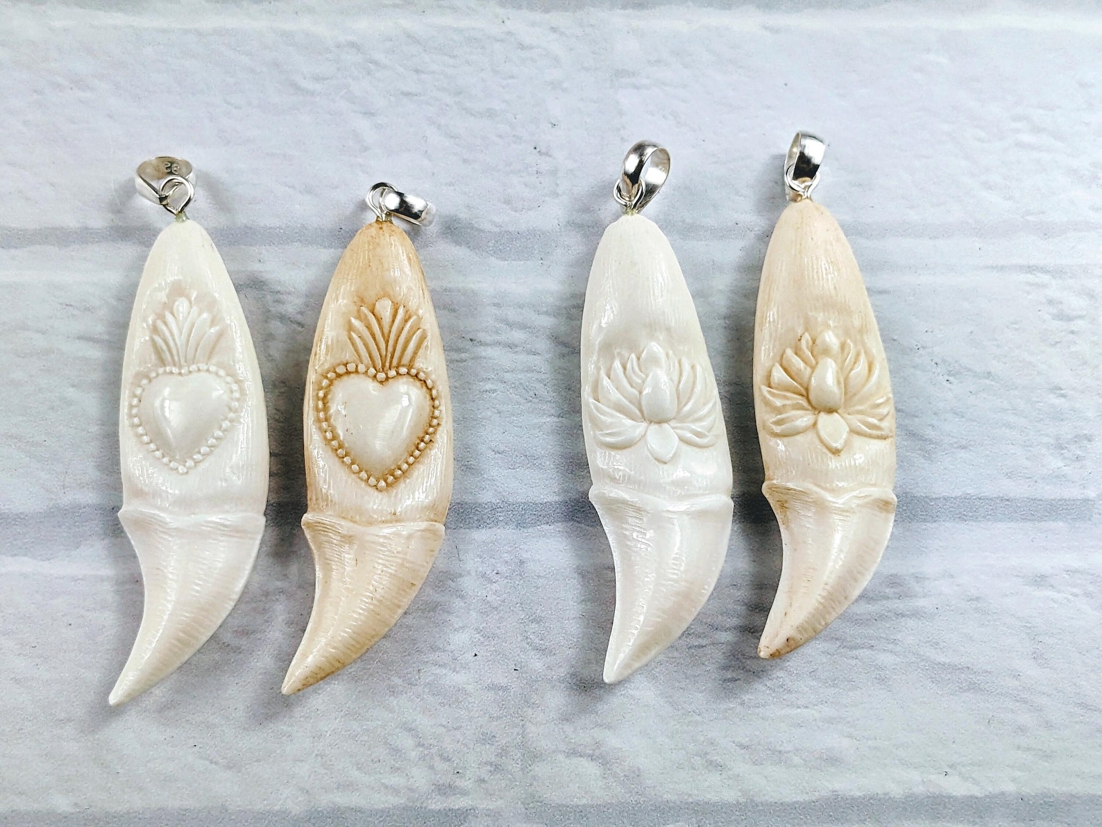 Hand Carved Buffalo Bone Sacred Heart or Lotus Flower Claw Pendant ...