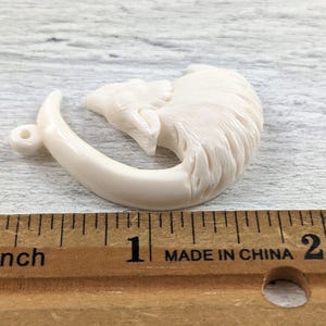 Hand Carved Buffalo Bone Howling at the Moon Wolf Pendant, Animal ...