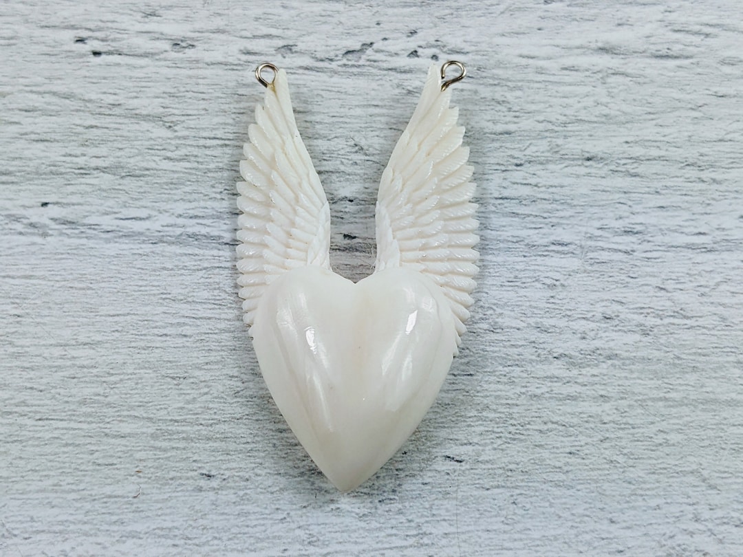 Hand Carved Buffalo Bone Flying Heart Pendant, Winged, Flying, Love ...