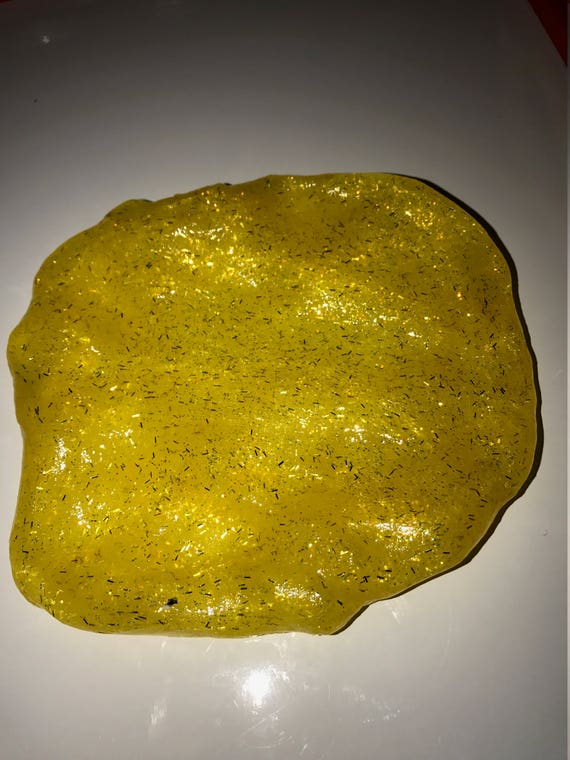 Items similar to Yellow glitter slime on Etsy