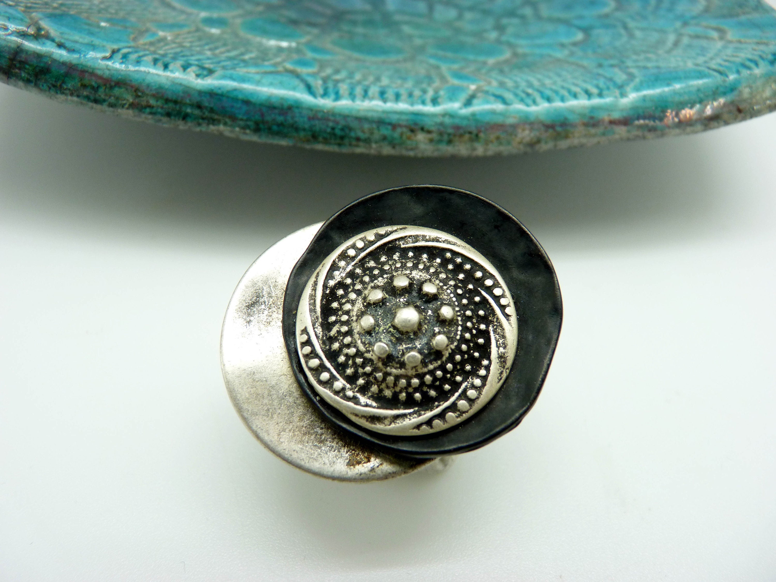 SILVER and black metal ring offbeat graphic CYCLONE