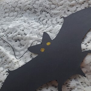 Hanging Bat Halloween Decoration: Gold Glitter Eyes, Stretchy String - Etsy
