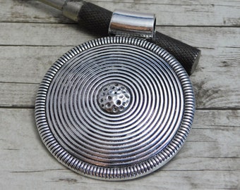 Metal medallions | Etsy