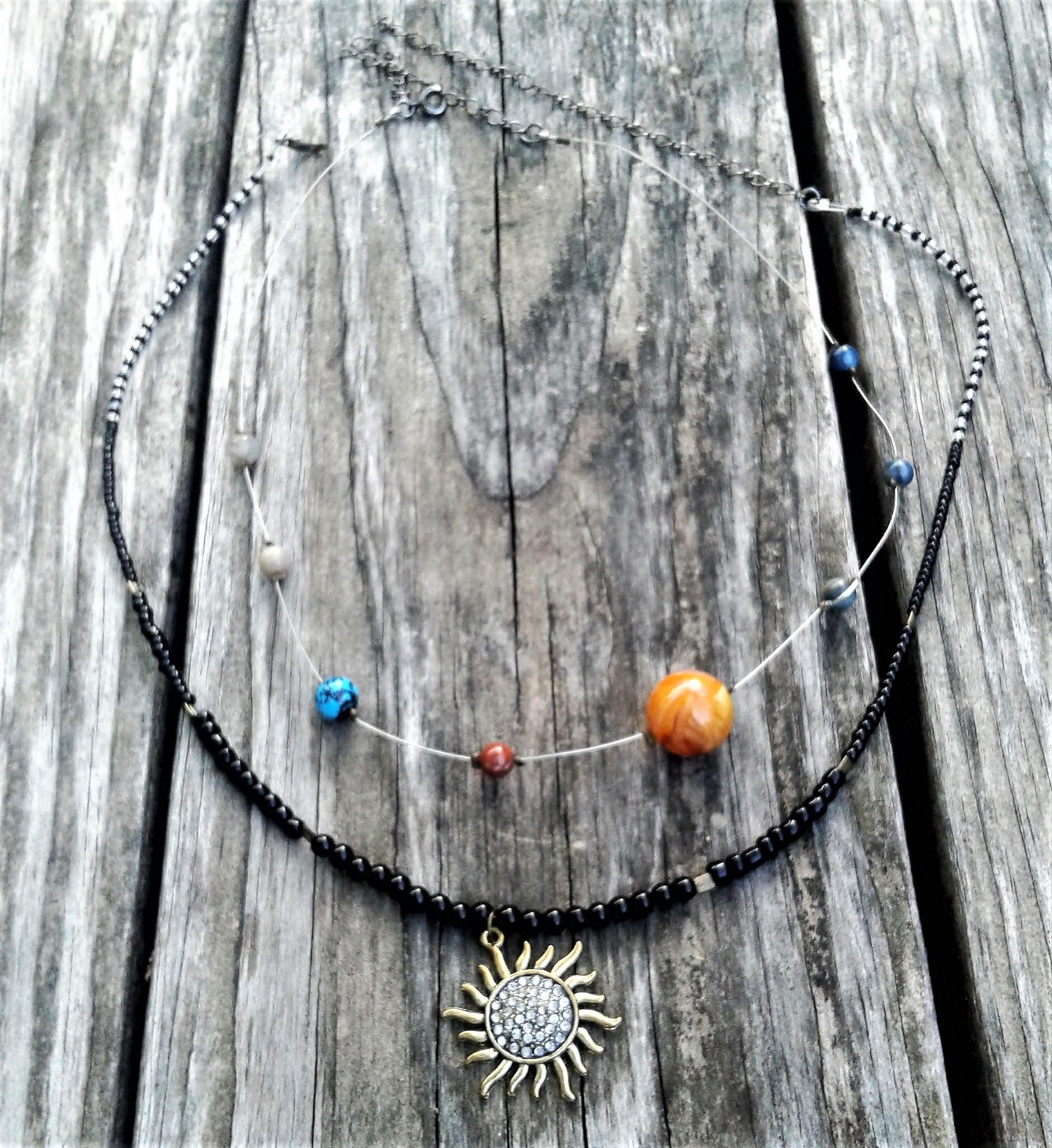 Sistema solar y collares solares - Etsy España