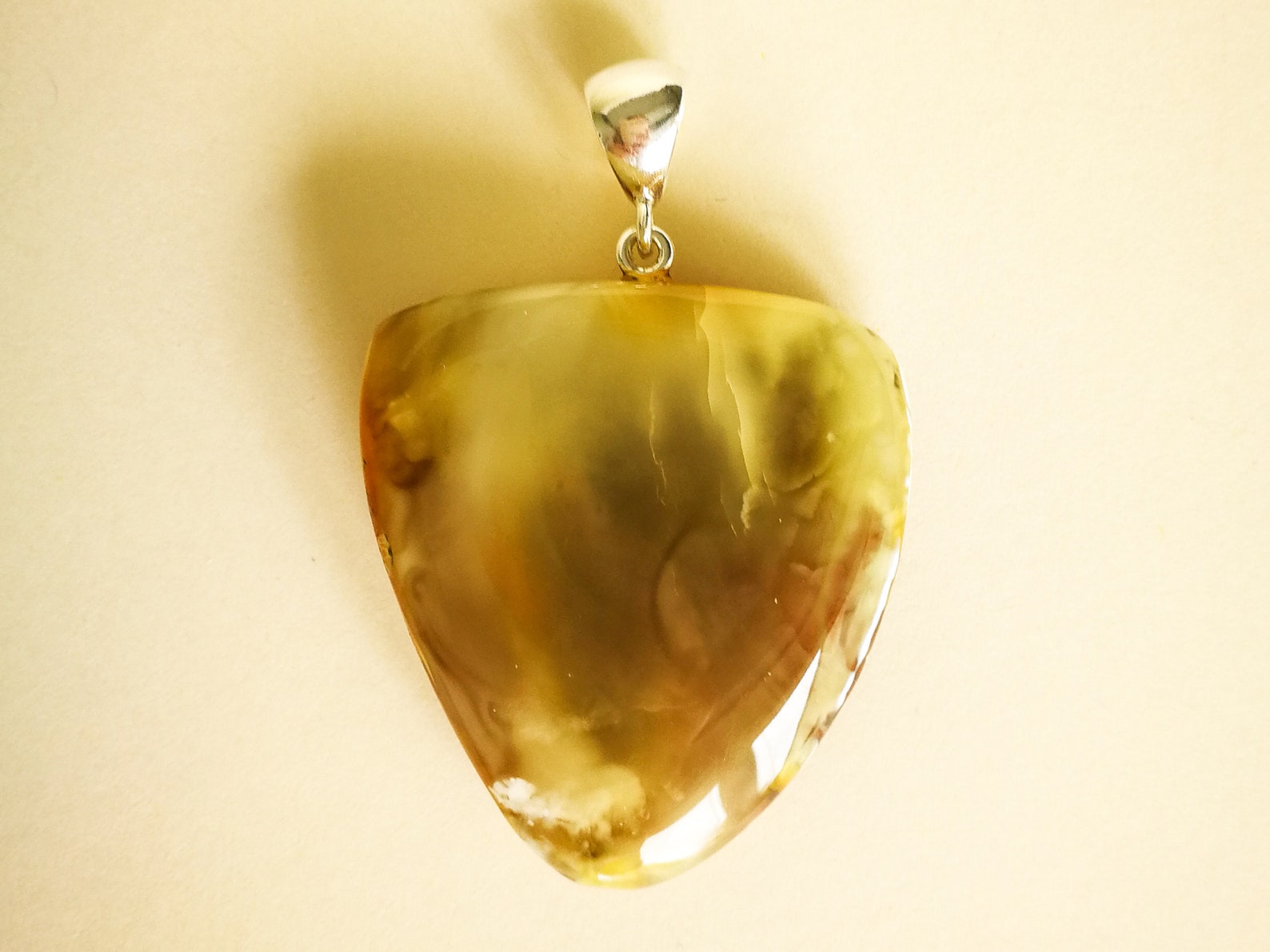 Gray upside triangle shape amber pendant with silver unique | Etsy